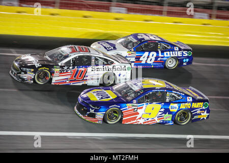 Drivers race four wide during a NASCAR Cup Series auto race at ...