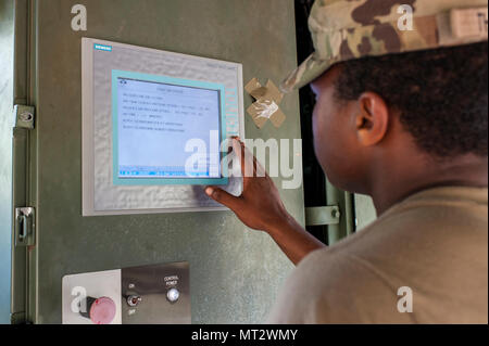 A Laundry Advanced System (LADS) is programed by the U.S. Army Reserve ...