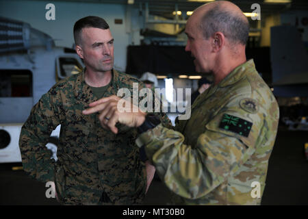 Col. Tye R. Wallace, left, Lt. Gen. Lawrence Nicholson, center, and U.S ...