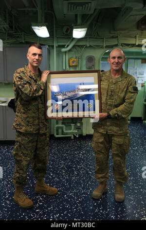 Col. Tye R. Wallace, left, Lt. Gen. Lawrence Nicholson, center, and U.S ...
