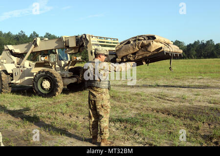 Spc. James Murphy Jr., a petroleum supply specialist with the 135th ...
