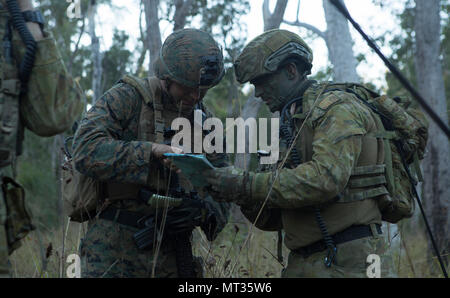 QUEENSLAND, Australia – U.S. Marine Capt. Thomas Schueman (left ...