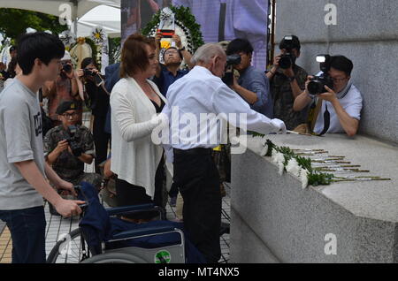 Task Force Smith’s war veteran places one flower on the memorial at the ...