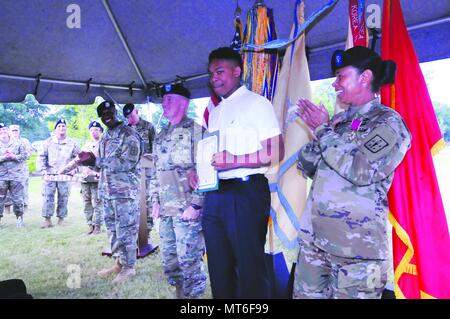 Col. Tamatha Patterson, 23rd Quartermaster Brigade commander, right ...