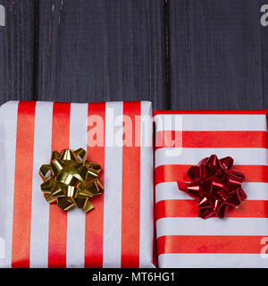 various gift boxes on wooden table, top view Stock Photo - Alamy