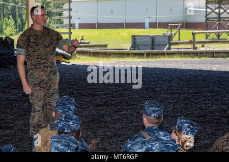 U.S. Marine Corps Capt. Joshua Cavan, commanding officer, Alpha Stock ...