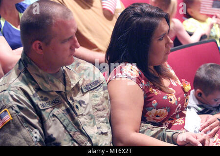 U.S. Army Spc. Jesse Parsons sits with is family during the deployment ...