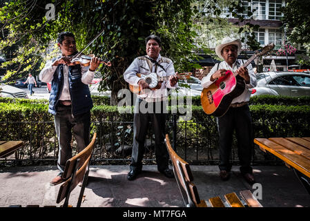 Street mexican musicians performig at Polanco, Mexico City Stock Photo ...