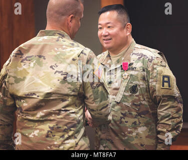 Col. Peter Kim, Senior Advisor to the Army National Guard speaks to ...