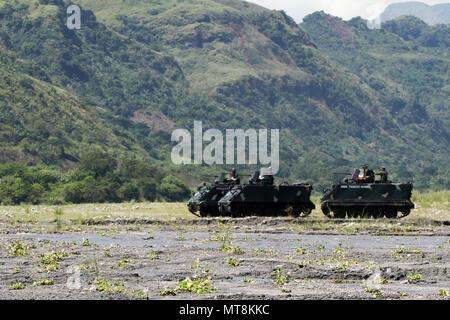 Philippine Army M113 armored personnel carriers are staged at the end ...