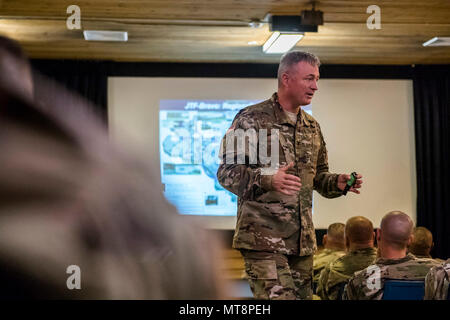 U.S. Army Col. Brian Hughes, Joint Task Force – Bravo, shakes hands ...