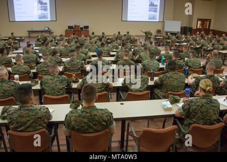 U.S. Marines with The Basic School (TBS) take off from the start line ...
