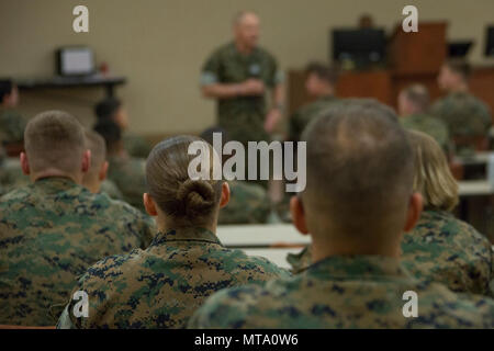 U.S. Marines with The Basic School (TBS) take off from the start line ...