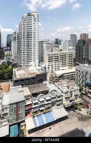 Modern city skyline with high rise buildings and a coastal promenade ...