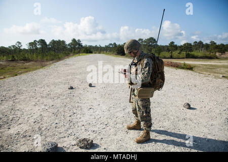 A Marine coordinates a fire mission with a Target Handoff System v2.0 ...