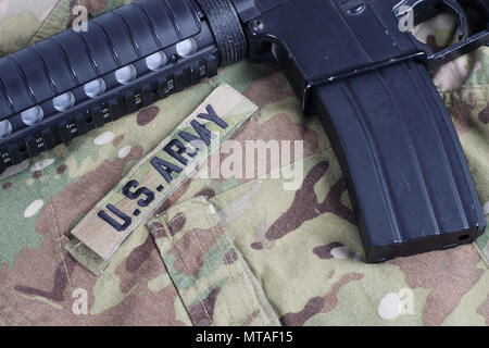 US Army M4 carbine with ammunitions on US Army uniform background Stock ...