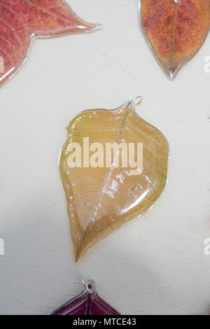 pendant with beautiful dry leaf inside resin Stock Photo - Alamy