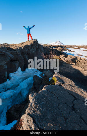 Man stands at Continental Rift between North American and Eurasian ...