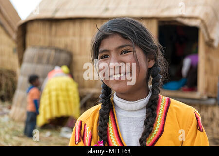 Native girl, portrait, tribe of the Urus, Lake Titicaca, Puno region ...