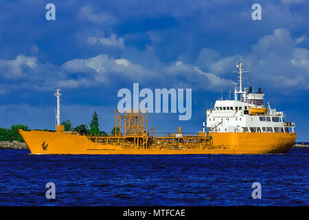 Yellow cargo tanker ship moving at the clear summer day Stock Photo - Alamy