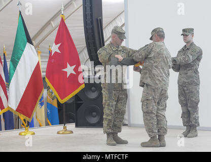 Col. Ryan Pace and Command Sgt. Maj. Thomas Mize case the 77th Combat ...