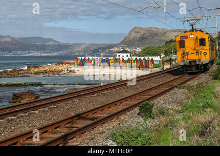 Yellow locomotive heading into simonstown station from simonstown ...