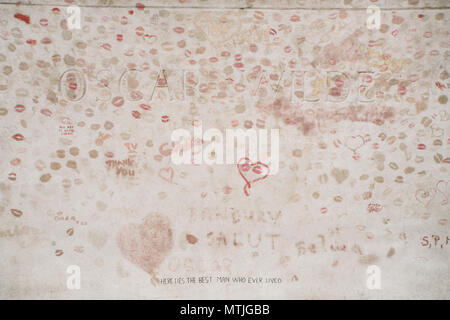 A headstone in a cemetery marks the grave of a young girl who died in 1931 in a small community ...