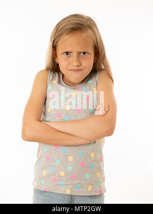 Emotional portrait of caucasian teenager child girl isolated on yellow ...