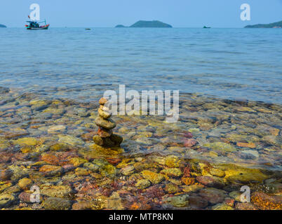 Sea pebble stones and multicolor rocks on beach at sunny day Stock ...