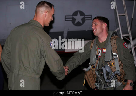 Col. Robert Cooper, left, welcomes Lt. Col. Shannon M. Brown, right ...