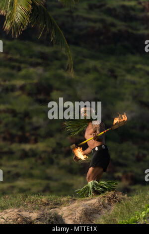 Male fire dancer performing with fire levi stick Stock Photo - Alamy