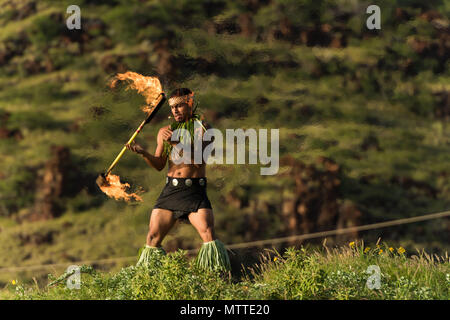 Male fire dancer performing with fire levi stick Stock Photo - Alamy