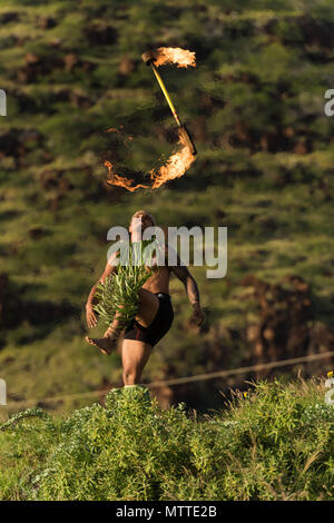 Male fire dancer performing with fire levi stick Stock Photo - Alamy
