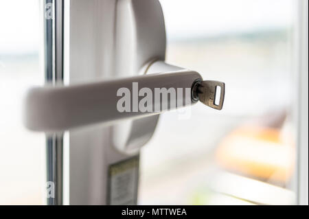 Double glazing white UPVC window frame with wrought iron security ...