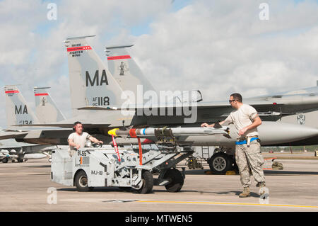 Staff Sgt. Timothy Mannion, the Three Man on the load crew, drives the ...