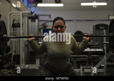 TSgt Brandy Foster, 422nd Communications Squadron, does a squat at the ...