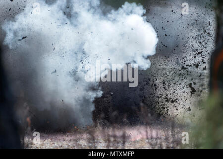 A M18 Claymore mine explodes after being detonated by paratroopers ...