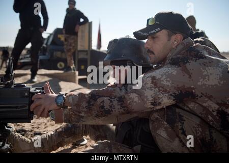 An Iraqi Counter-Terrorism Service instructor demonstrates how to ...
