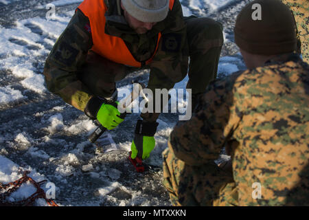 Norwegian Home Guard 12 base commander, Col. Hakon Warø, addresses the ...
