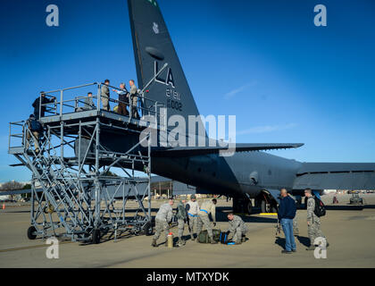 Crew chiefs from the 20th Aircraft Maintenance Unit move a drag chute ...