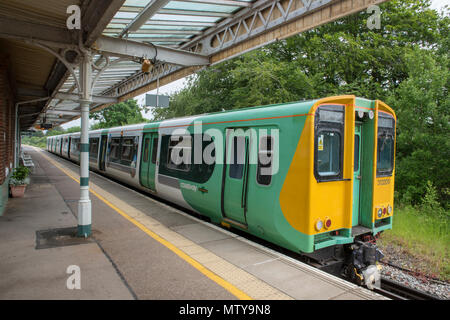 class 313 electric multiple unit train in the platform on the southern ...