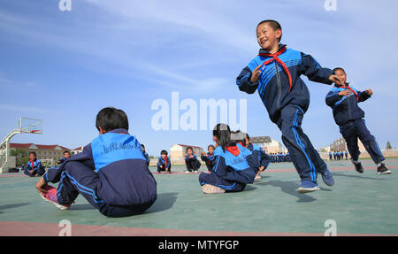 Xinjian, Xinjian, China. 31st May, 2018. Beitun, CHINA-Kids celebrate ...