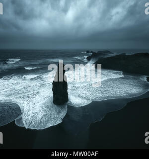 Reynisdrangur sea stacks off Black Sand Beach, Reynisfjara, Iceland ...