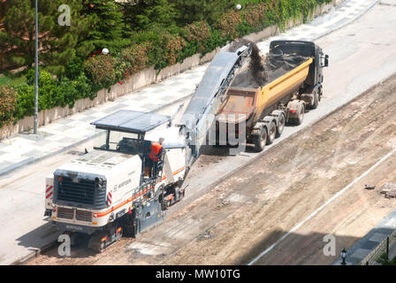 Asphalt pavement milling operation in advance of repaving Stock Photo ...