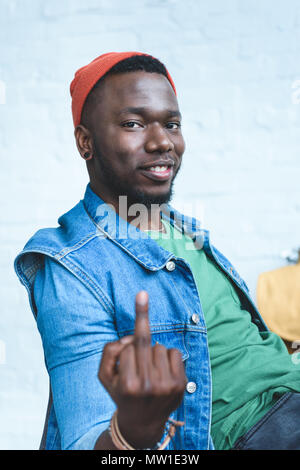 Man showing the middle finger, black and white Stock Photo - Alamy