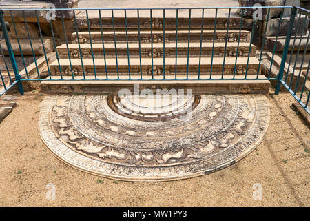 Sandakada Pahana or Moon stone at the entrance of old buddhist temple ...