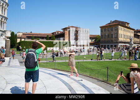 PISA, ITALY - JULY 2016: People walking in the historical streets of ...