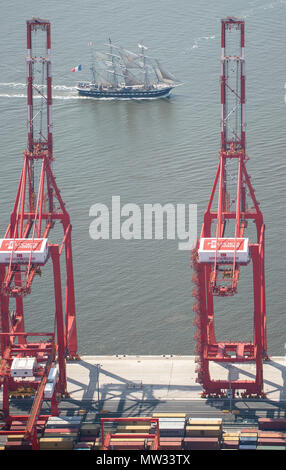 Aerial photo of tall ships passing Port of Liverpool tall red cranes ...