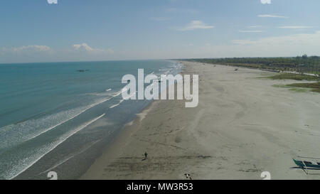 Aerial view of sandy beach Lingayen with azure water on the island ...