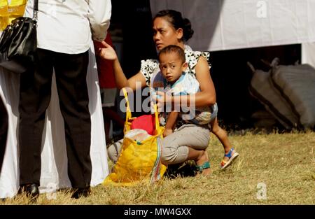 Residents shop for basic commodities in low-cost markets (Photo by Ajun ...